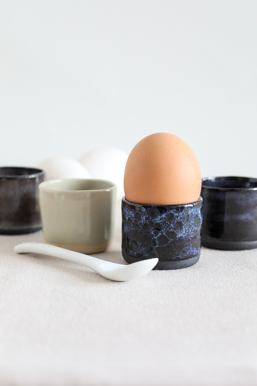 Set of 4 Egg Mugs - light celadon + dark moon + black storm + before ...